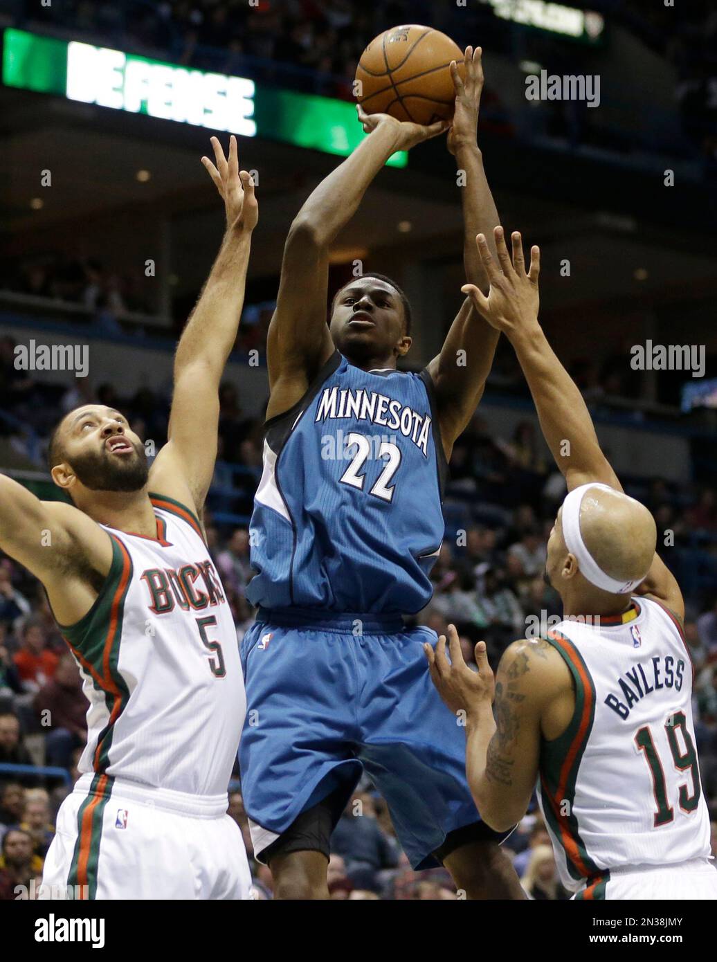 Minnesota Timberwolves' Andrew Wiggins shoots over Milwaukee Bucks ...
