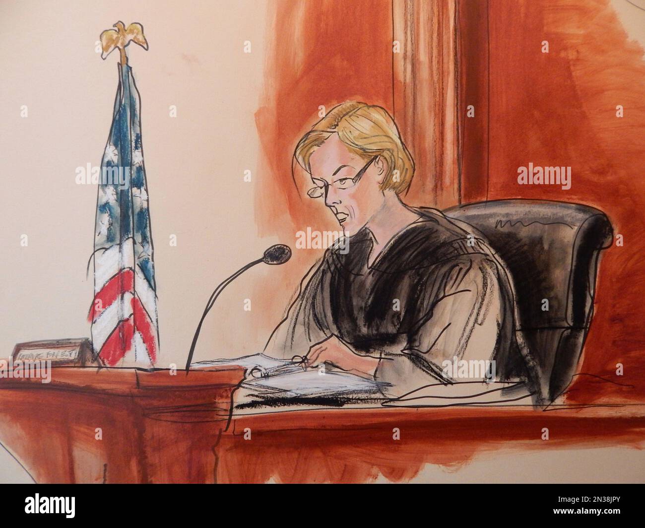 In this courtroom sketch U.S. District Judge Katherine Forrest reads ...
