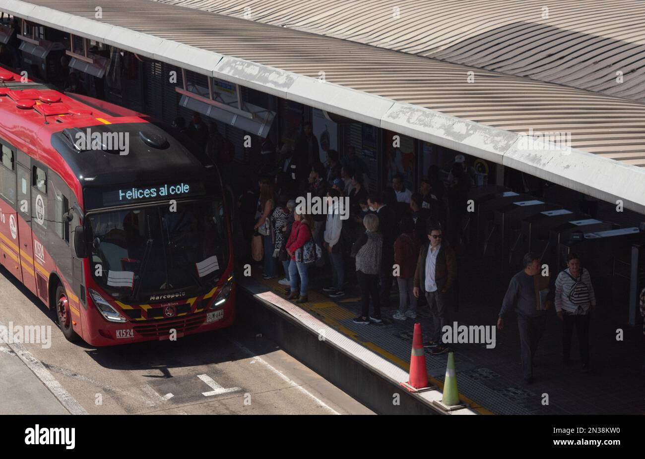 BOGOTA, COLOMBIA - A red transmilenio massive transportation bus ...
