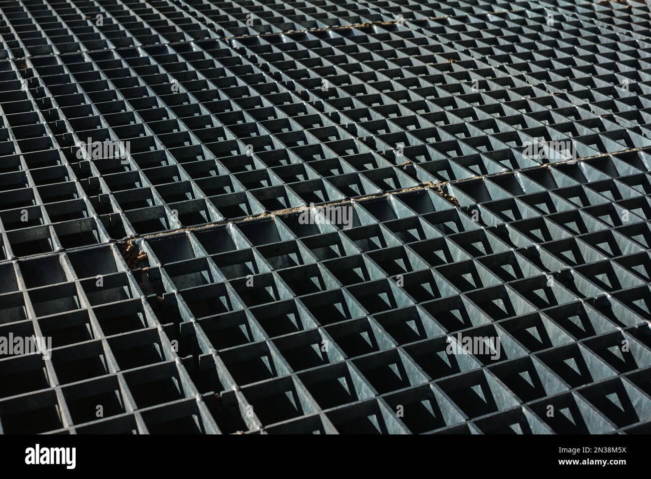 Closeup of heavy weight steel grating Stock Photo - Alamy