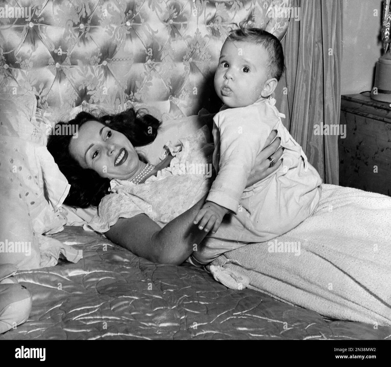 Zsa Zsa Gabor Hilton holds her six-moth-old daughter Constance ...