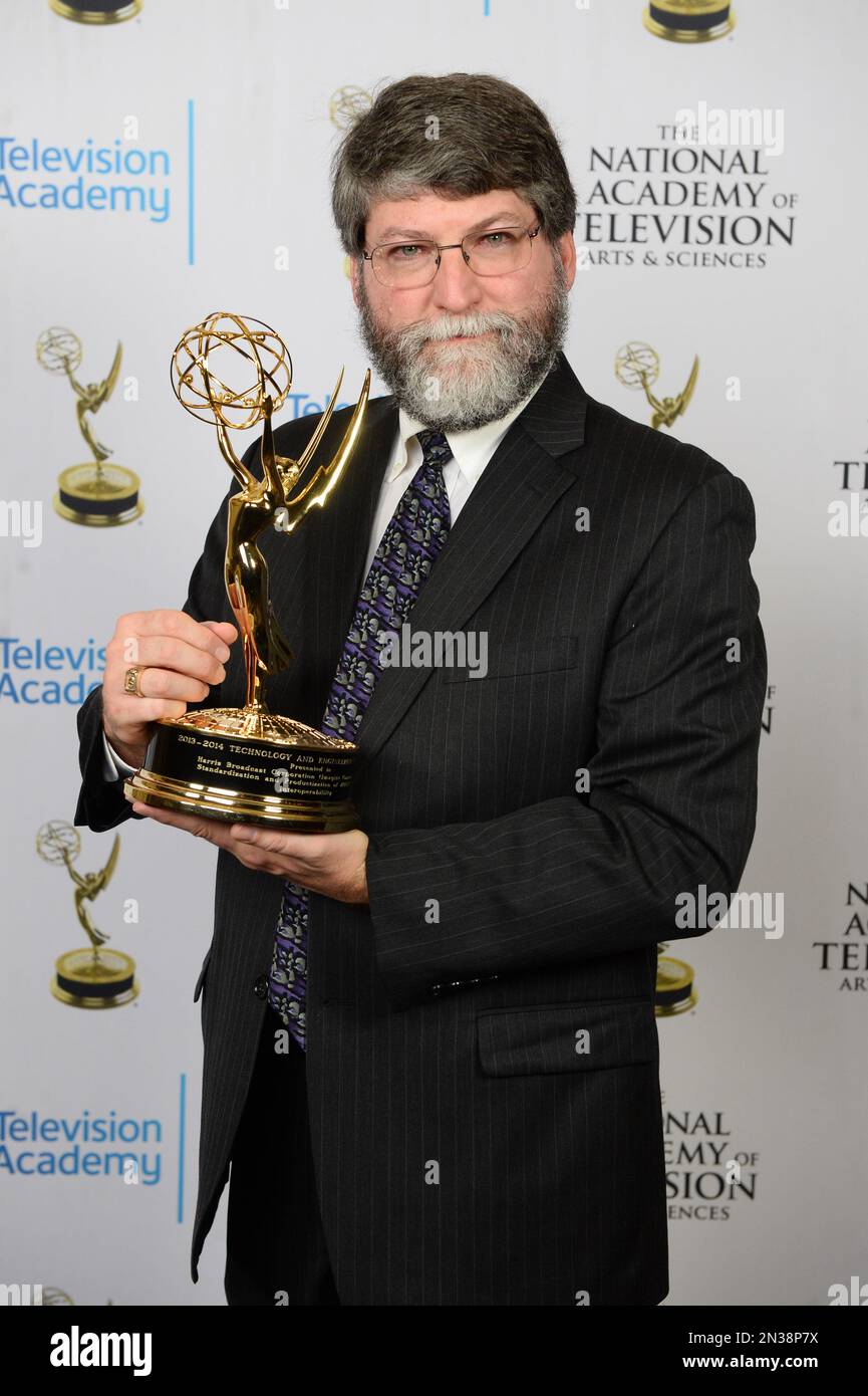 John Mailhot of Harris Broadcast Corporation poses backstage with the ...