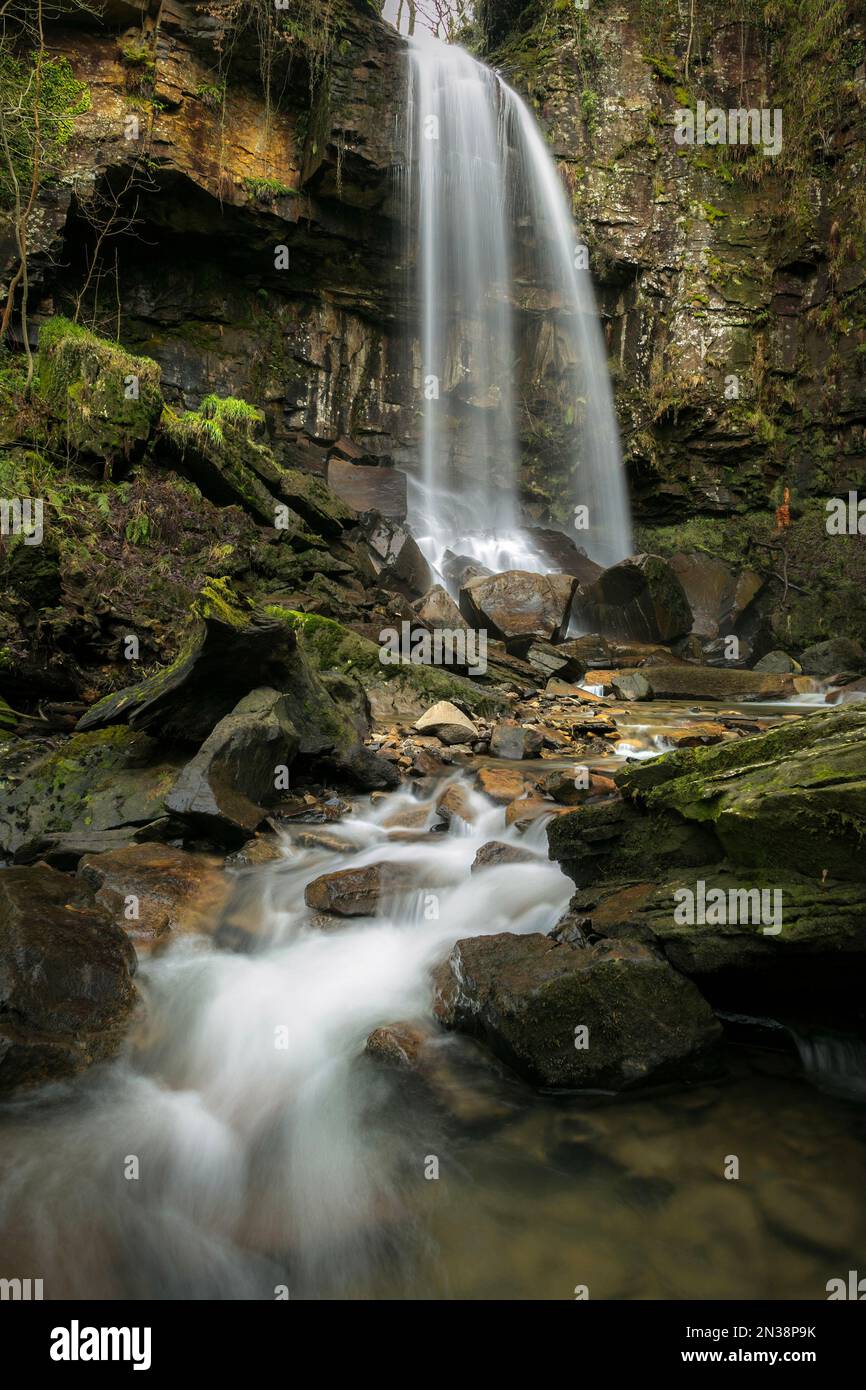 The tall beautiful waterfall in Resolven village in Neath, South Wales ...