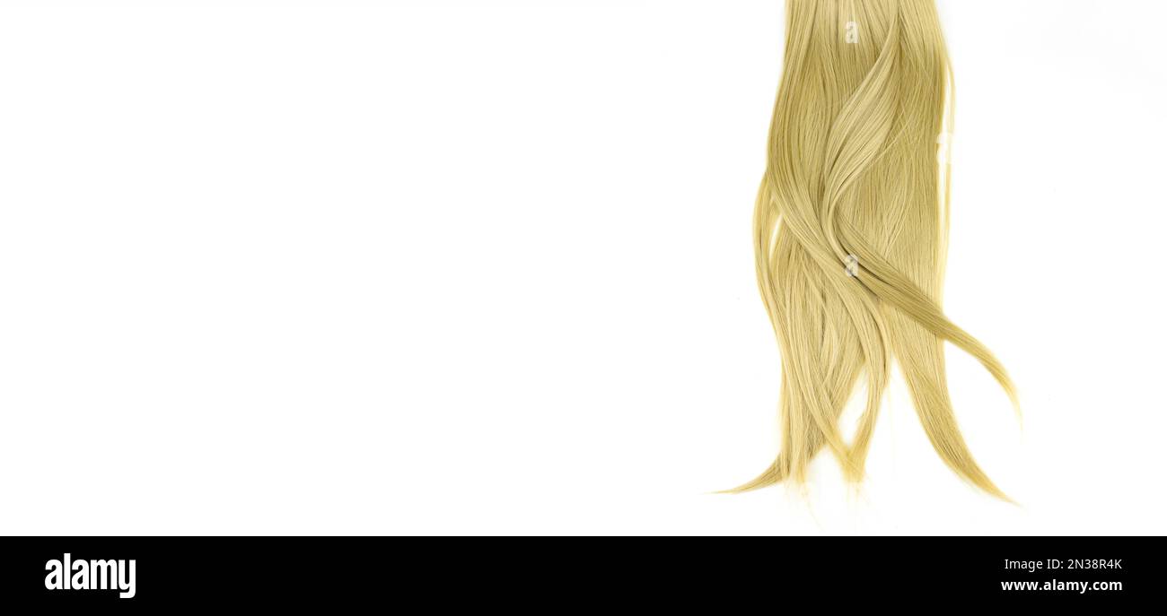 Strand of blond silky hair on a white background. Hairstyle, haircut in ...