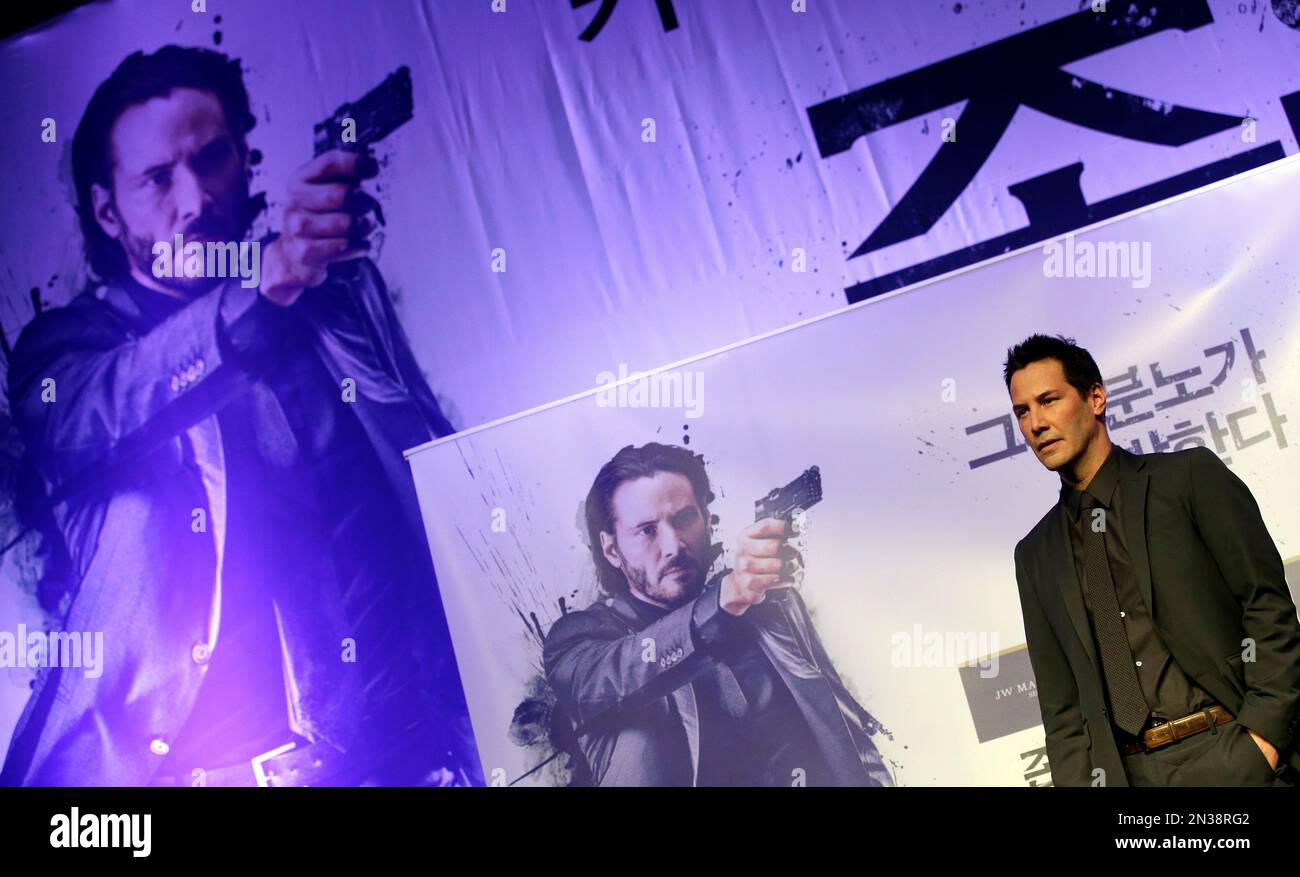 Actor Keanu Reeves poses for the media during a press conference for ...