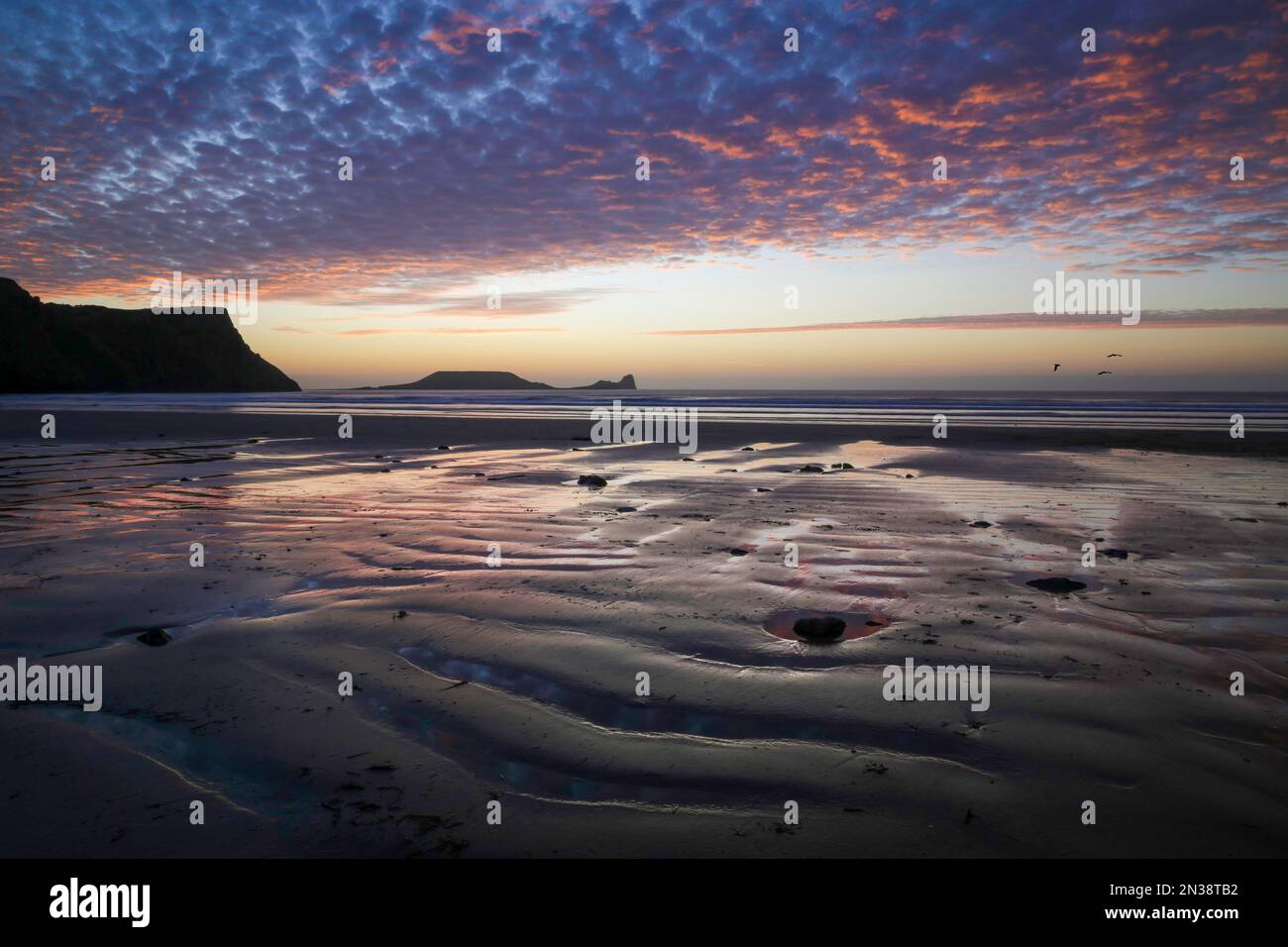 Dusk and a wonderful sky at Worms Head on the Gower peninsula in ...