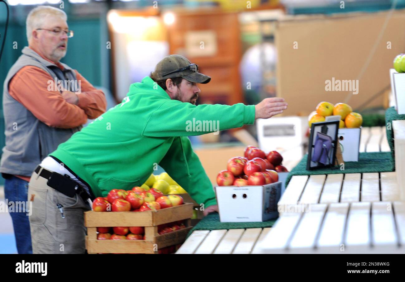 Farmers Bruce Hollabaugh, left and his son Bruce Hollabaugh, right, are ...