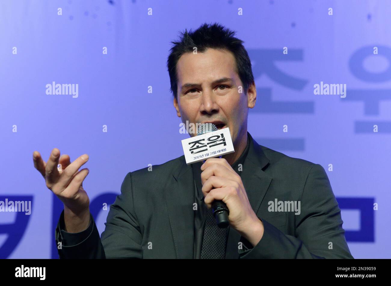 Actor Keanu Reeves speaks during a press conference for his new movie ...