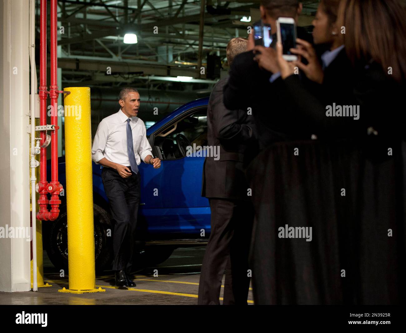 President Barack Obama arrives to speak at Ford Michigan Assembly Plant ...