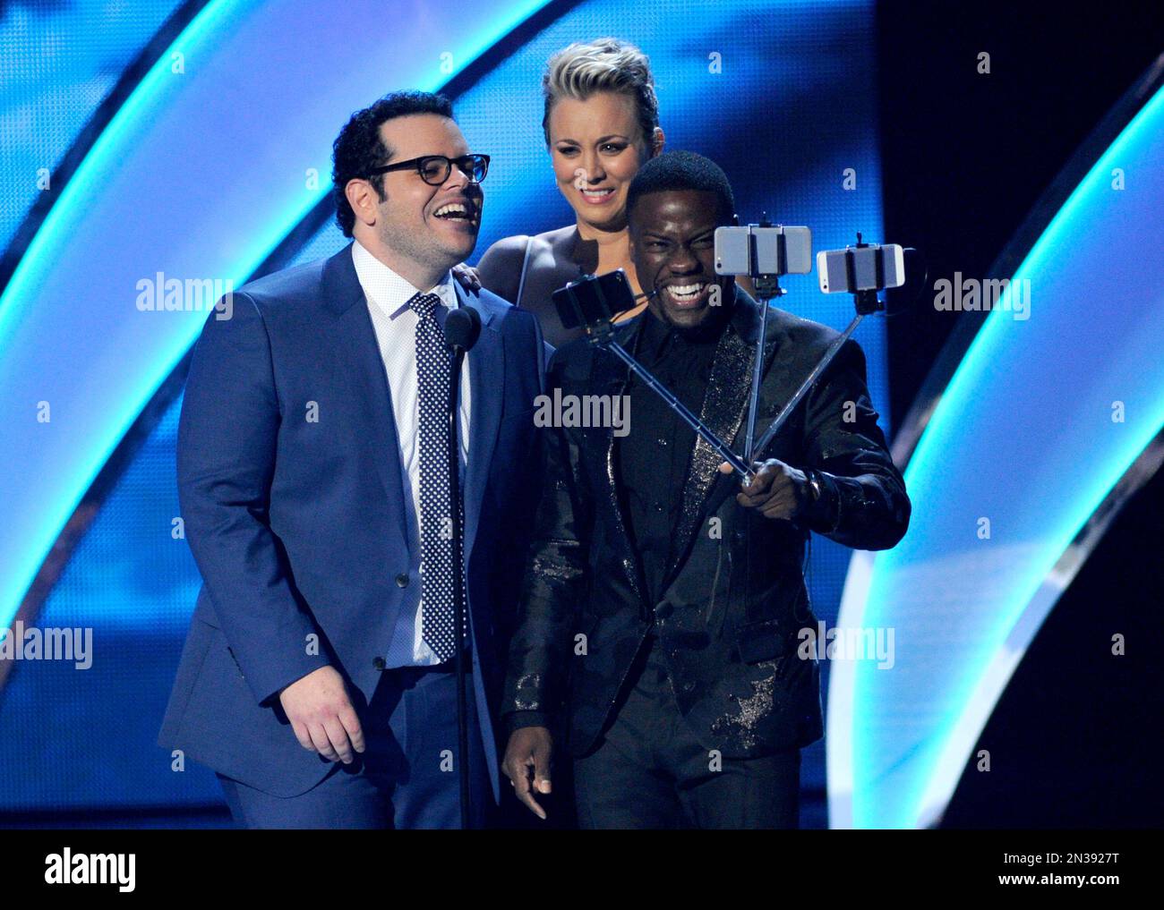 Josh Gad, from left, Kaley Cuoco-Sweeting, and Kevin Hart present the ...