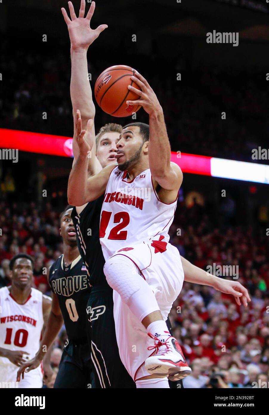 Wisconsin's Traevon Jackson (12) drives to the basket against Purdue's ...