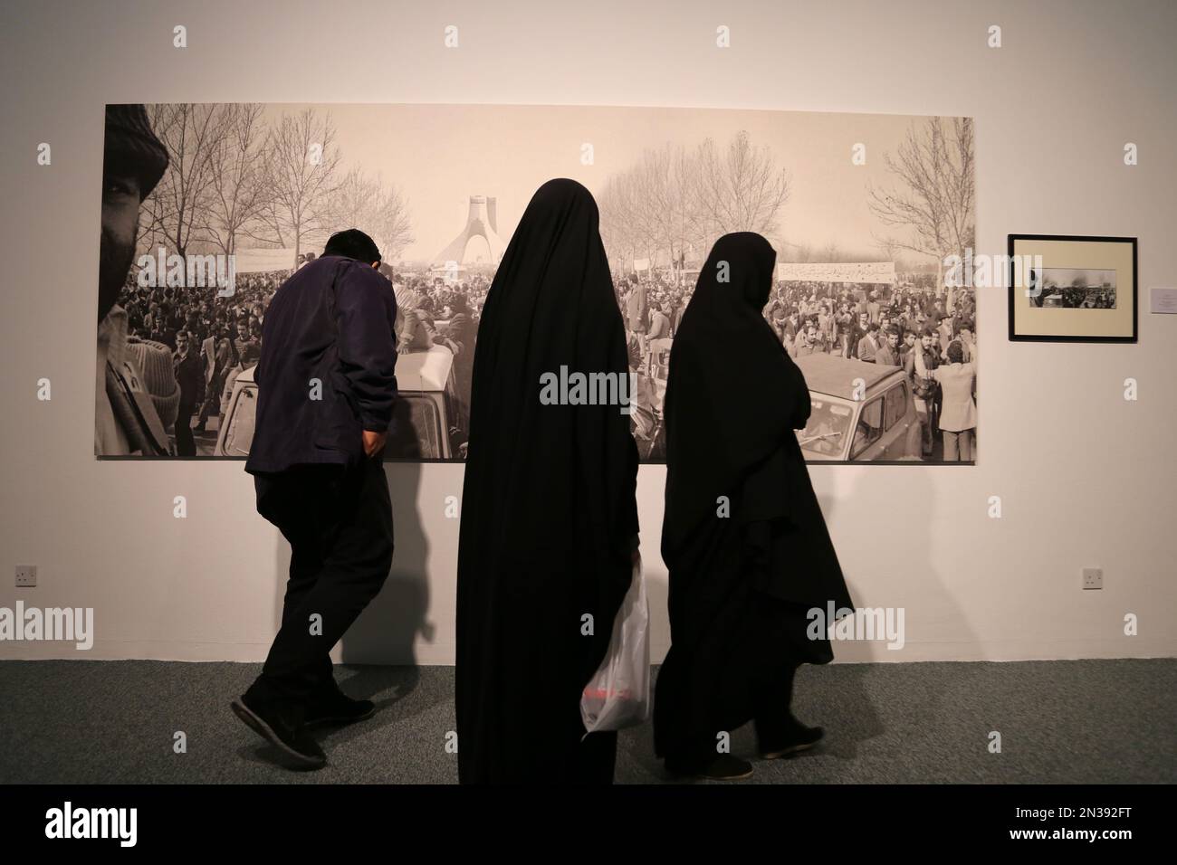 Tehran, Tehran, Iran. 7th Feb, 2023. Iranians look at a photograph by ...