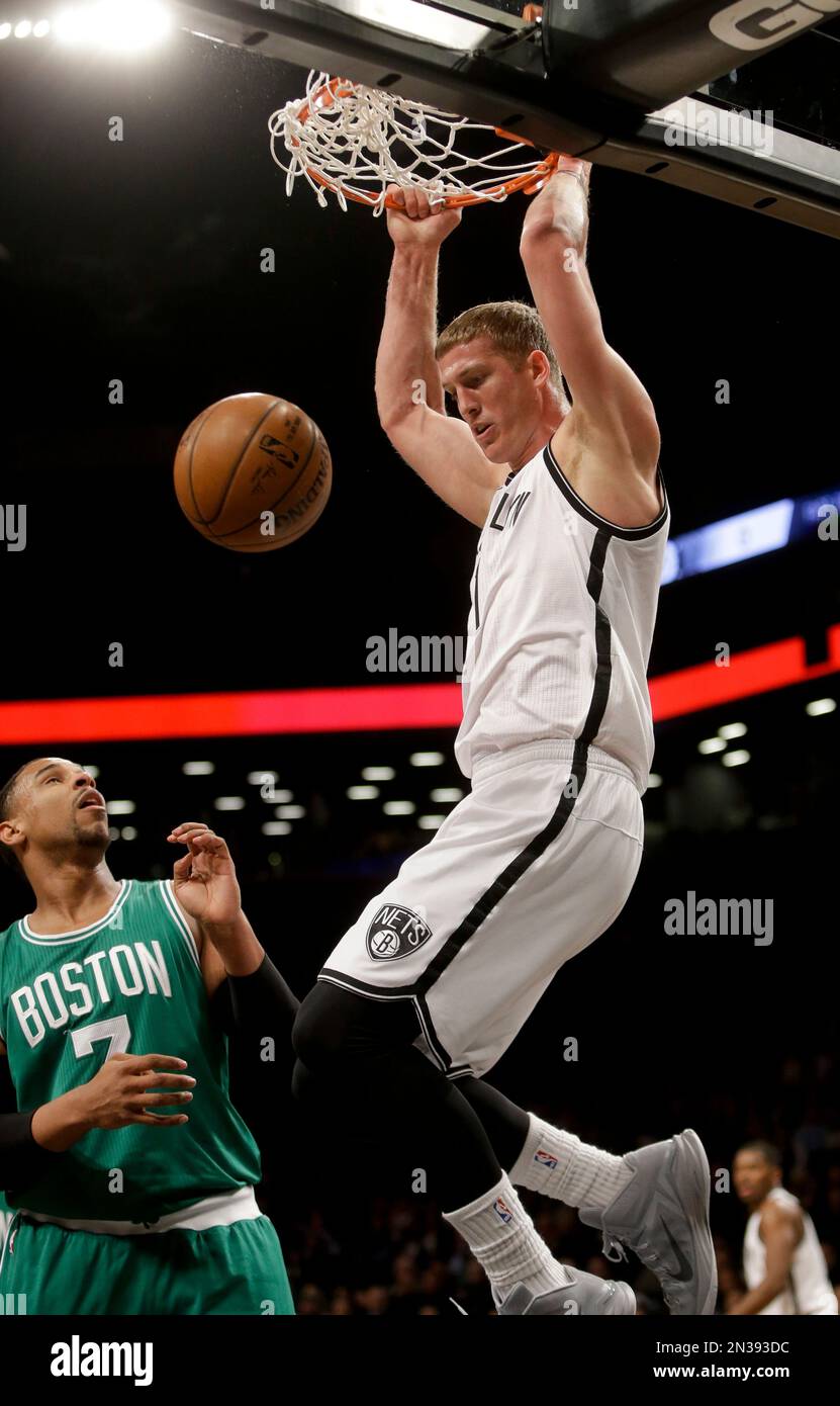 Brooklyn Nets' Mason Plumlee (1) dunks in front of Boston Celtics ...