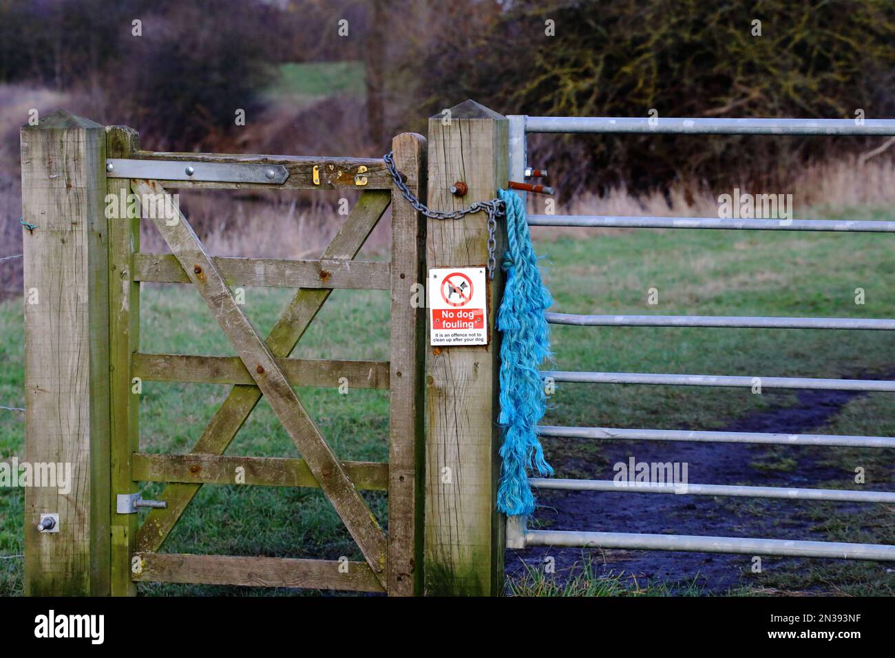 a public footpath gate on farmland with a No dog fouling sign Stock ...