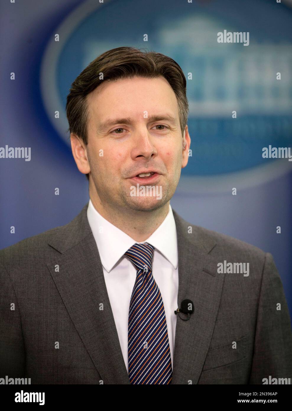 White House press secretary Josh Earnest speaks during a television ...