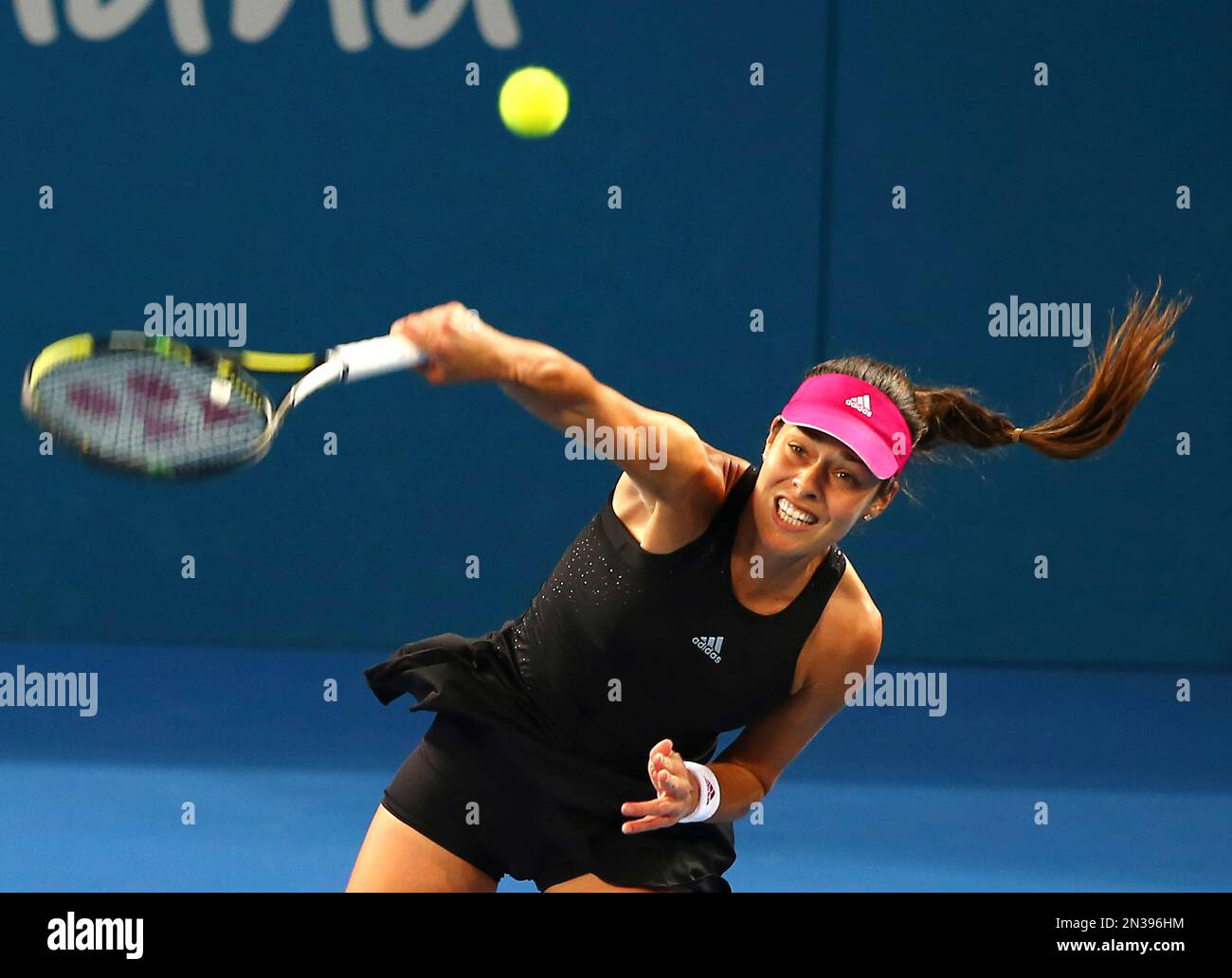Ana Ivanovic of Serbia plays a shot in her match against Jarmila ...