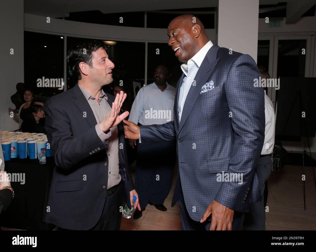 Lifetime EVP and GM Rob Sharenow and Magic Johnson attend the Premiere ...