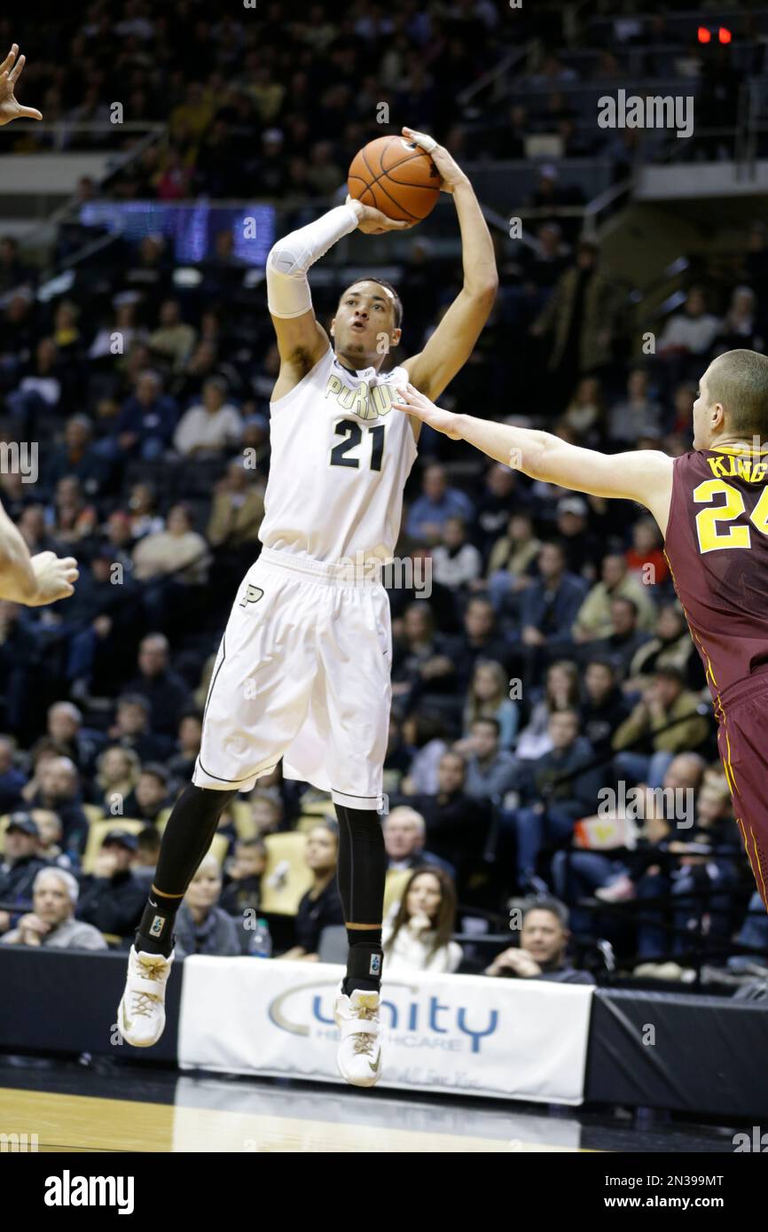Purdue guard Kendall Stephens (21) shoots over Minnesota forward Joey ...