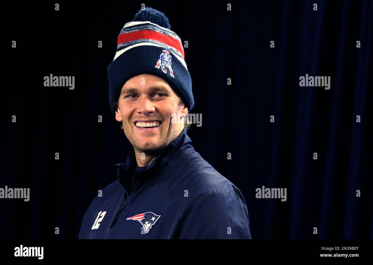 New England Patriots quarterback Tom Brady smiles during a news ...