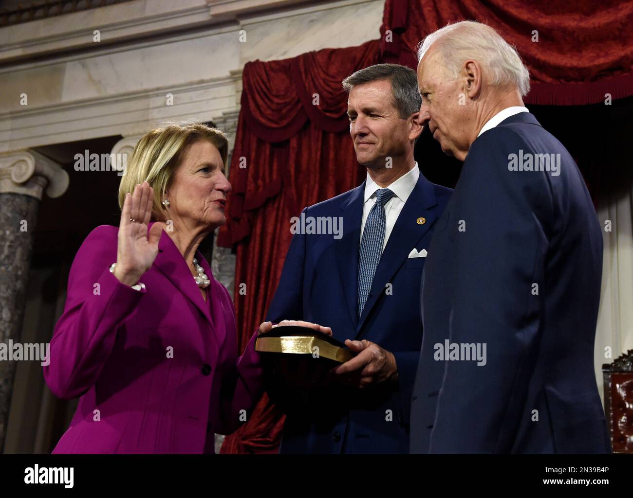 Vice President Joe Biden administers the Senate oath to Sen. Shelley ...