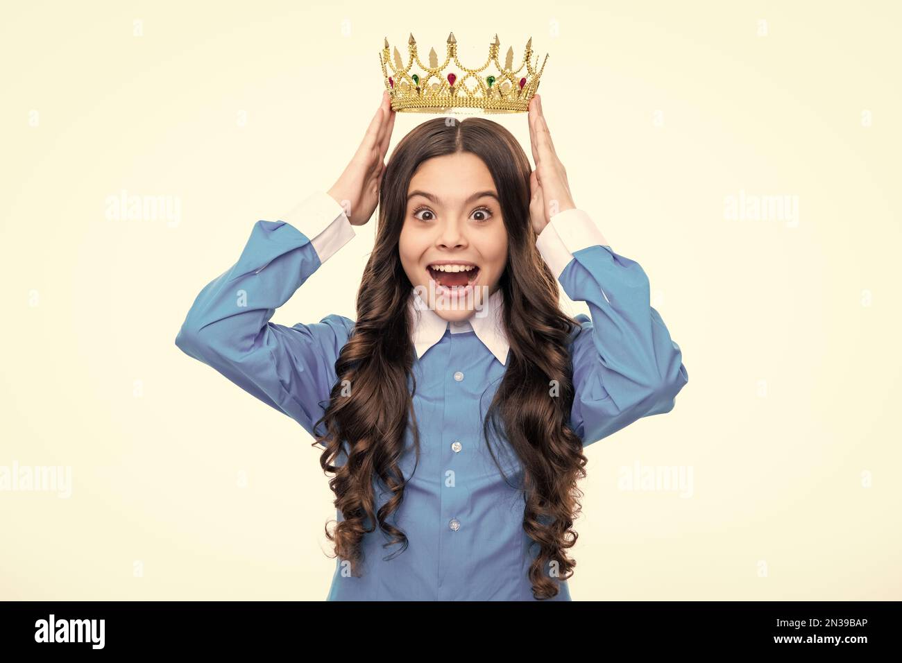 Excited face. Portrait of ambitious teenage girl with crown, feeling ...