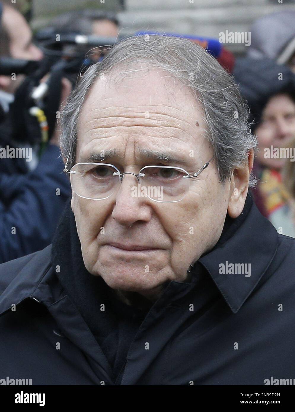 French film director Robert Hossein leaves the Saint Germain des Pres ...