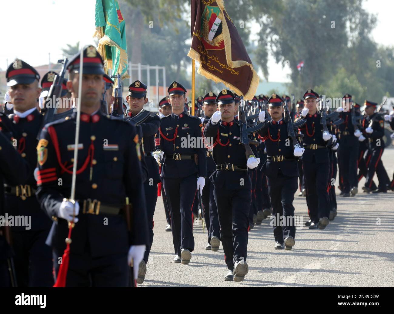 Iraqi Army soldiers march during the Army Day celebrations in Baghdad ...