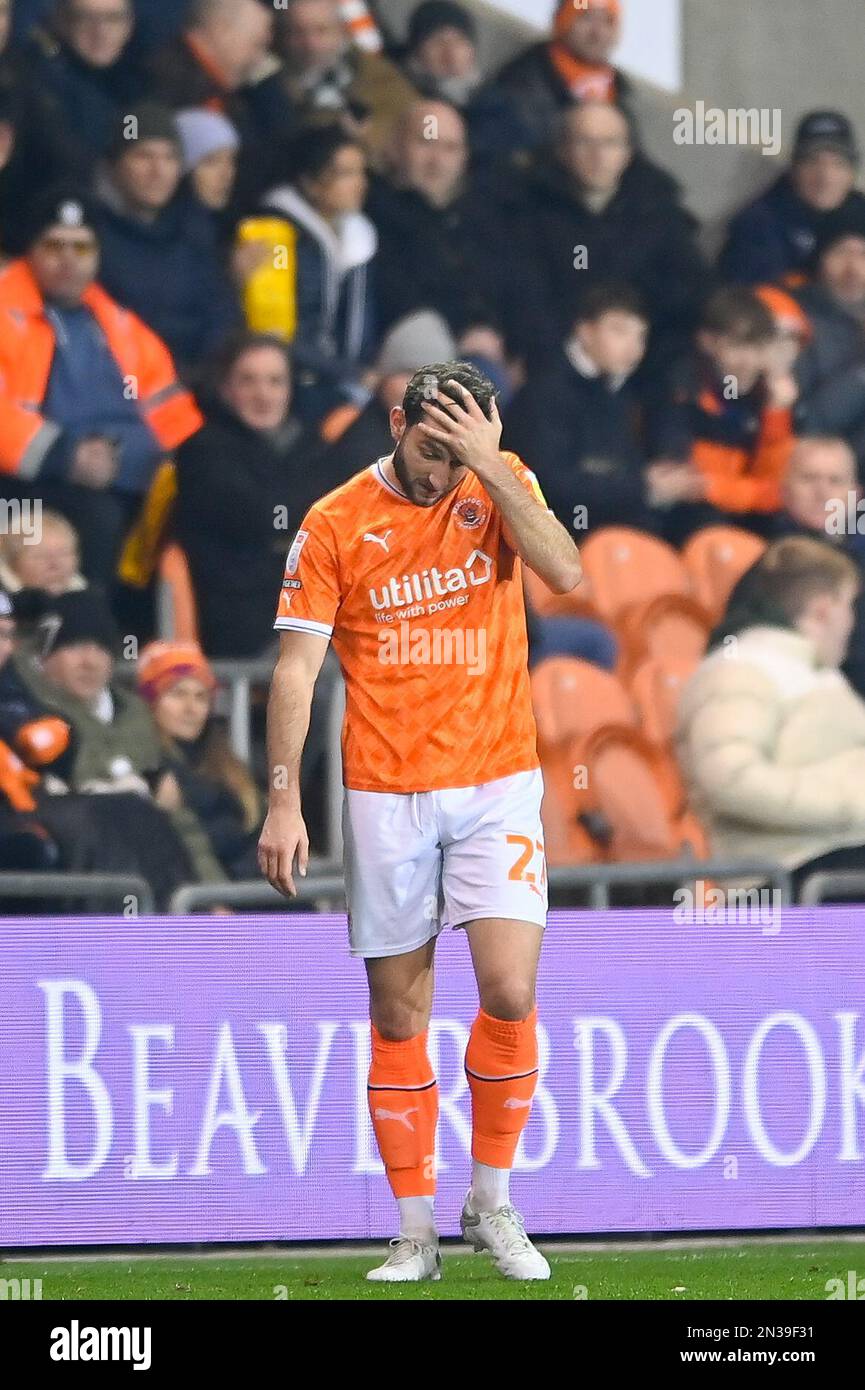 Charlie Goode #27 of Blackpool goes off injured during the Sky Bet ...