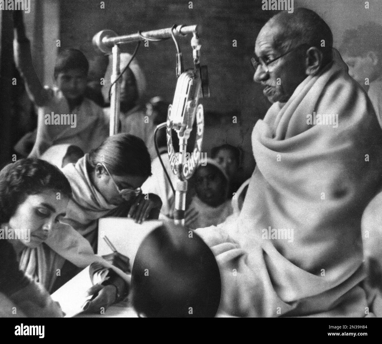 Authority sitting meeting writing hi-res stock photography and images ...