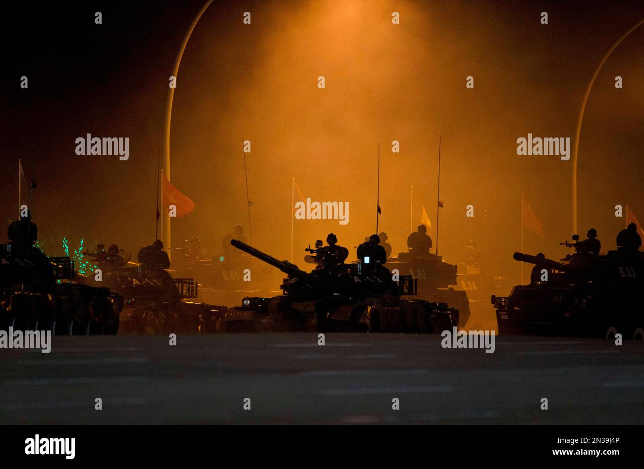 In this Sunday, Jan. 4, 2015 photo, armed-cars and tanks participate in ...