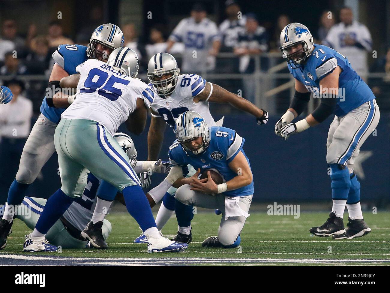 Dallas Cowboys' Jeremy Mincey (92) sacked Detroit Lions' Matthew ...