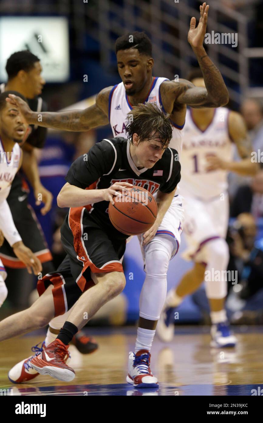 UNLV guard Cody Doolin (45) works around Kansas forward Jamari Traylor ...