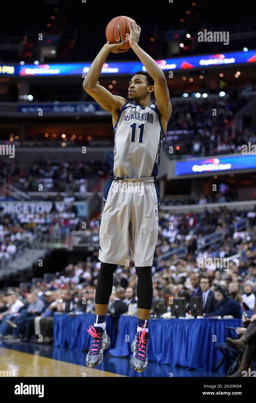 Georgetown forward Isaac Copeland (11) takes a shot against Creighton ...