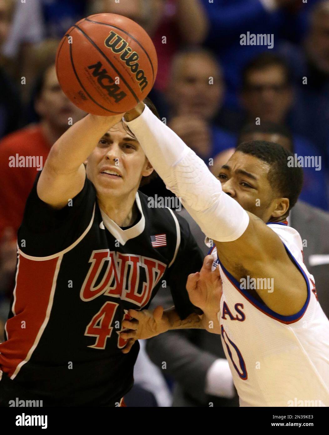 Kansas guard Frank Mason III, right, steals the ball from UNLV guard ...