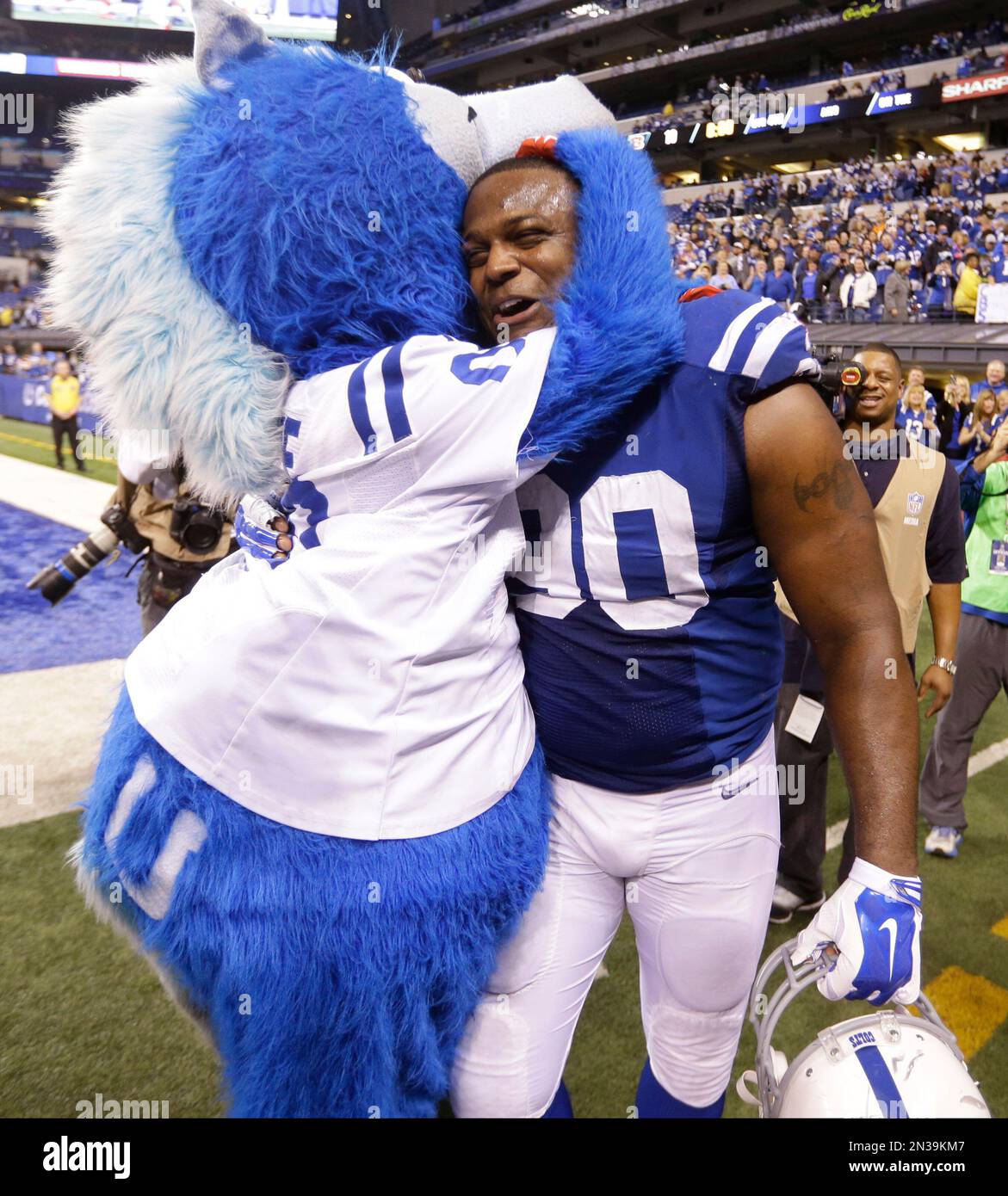 Indianapolis Colts defensive end Cory Redding gets a hug from the Colts ...