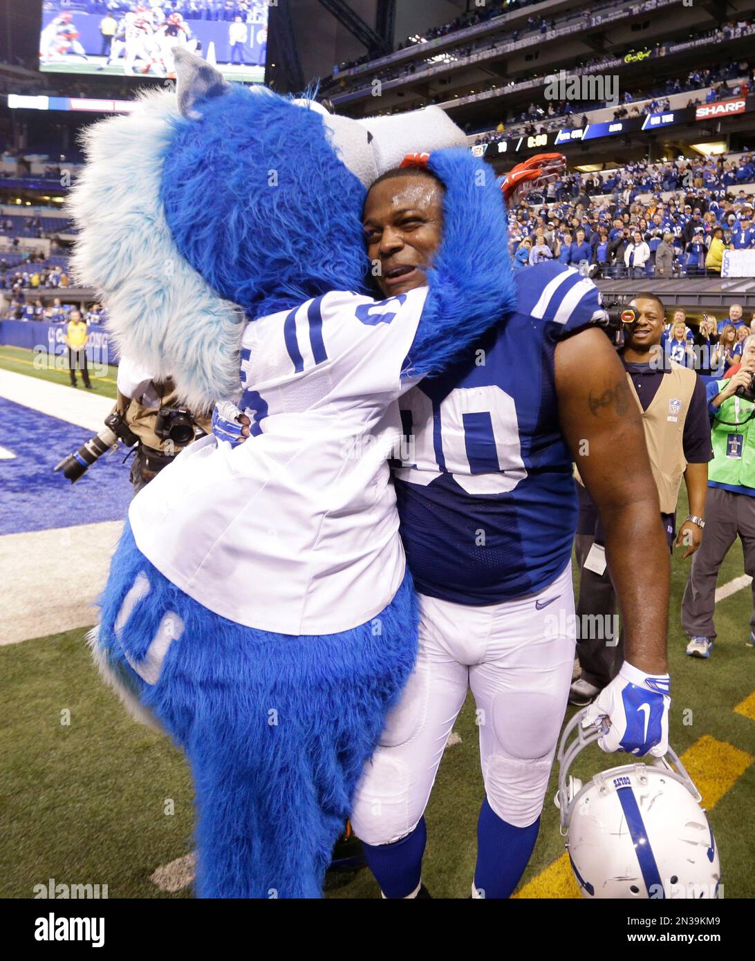 Indianapolis Colts defensive end Cory Redding gets a hug from the Colts ...