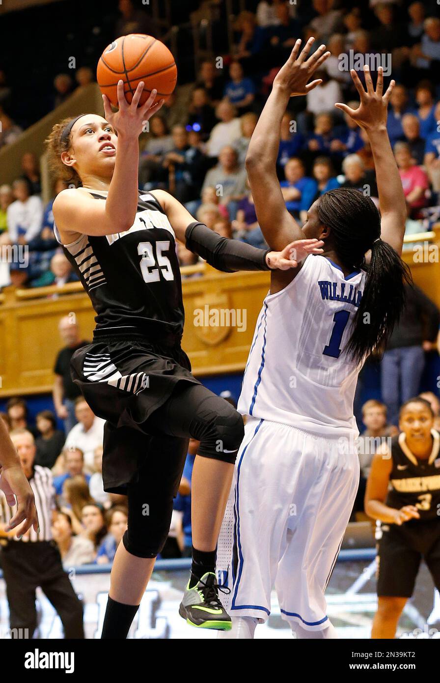 Wake Forest's Dearica Hamby, left, goes to the basket against Duke's ...