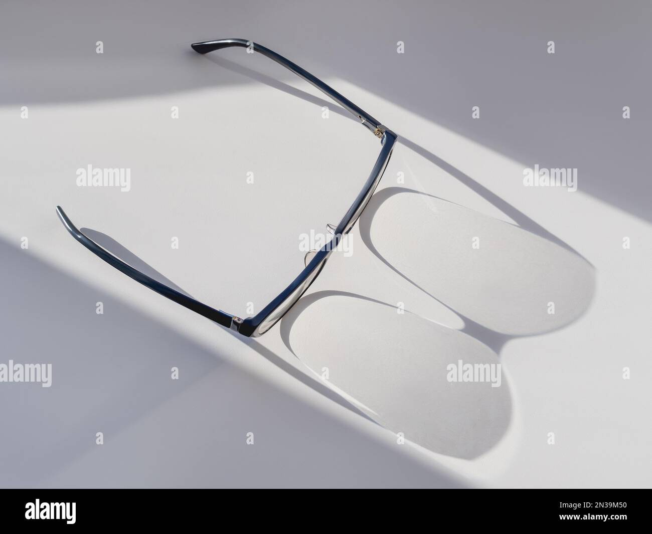 Top view of eyeglasses on white background. Comfortable life with poor ...