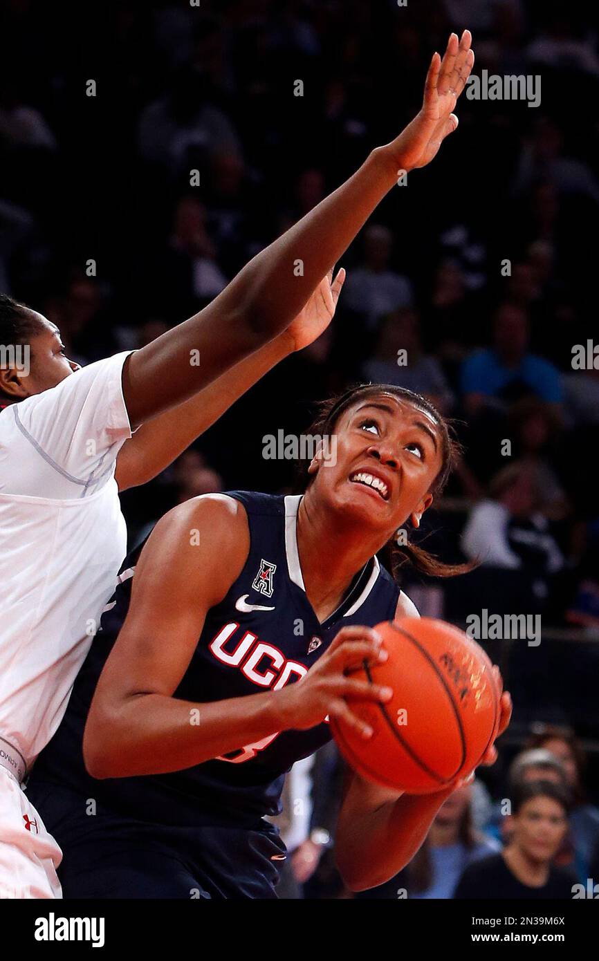 Connecticut's Morgan Tuck (3) looks to shoot against St. John's Jade ...