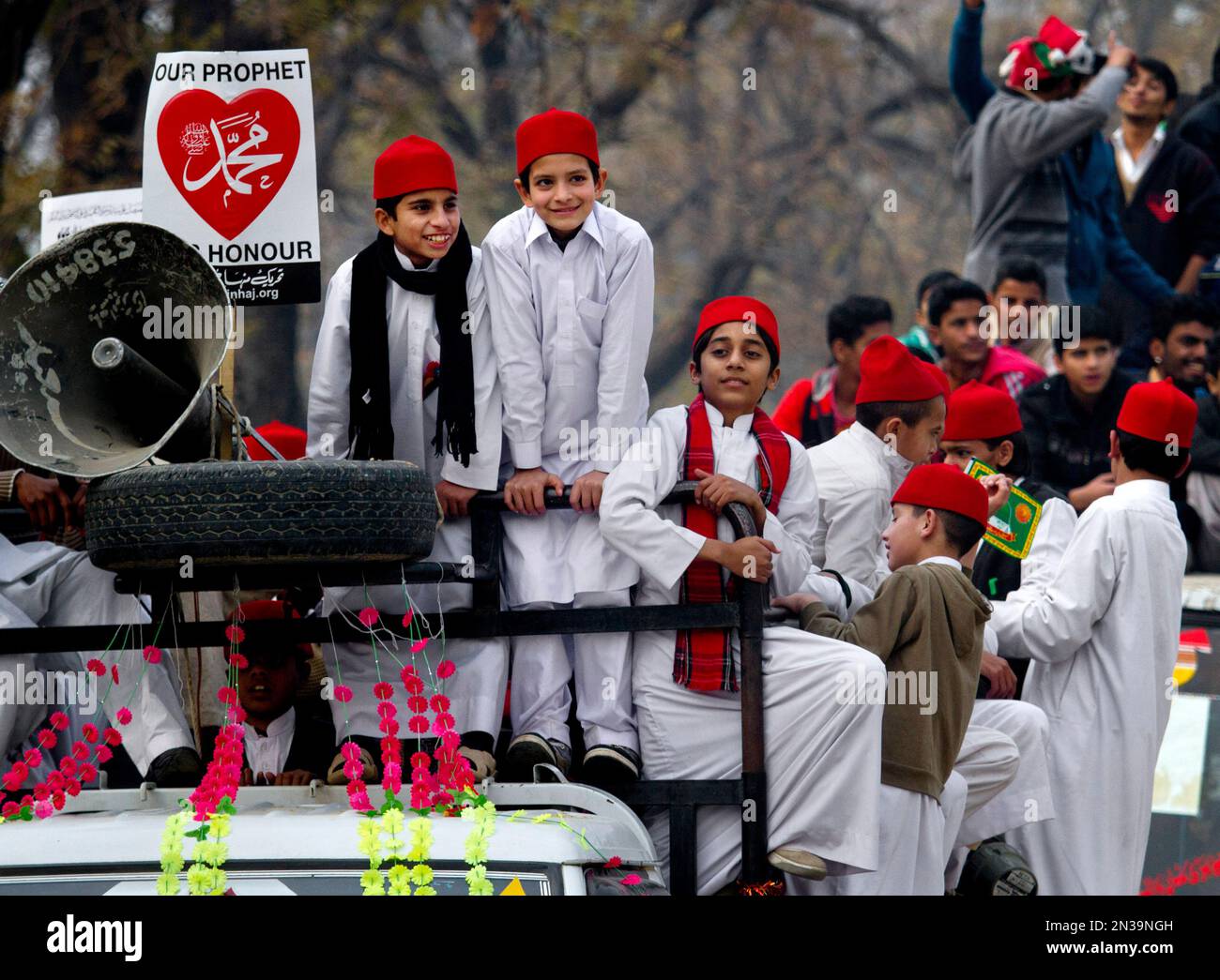 Pakistani boys take part in a rally marking the birthday of Islam's ...