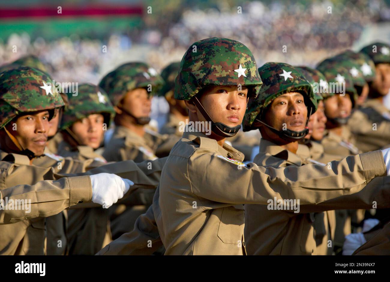 Myanmar military officers march in a parade during a ceremony to mark ...