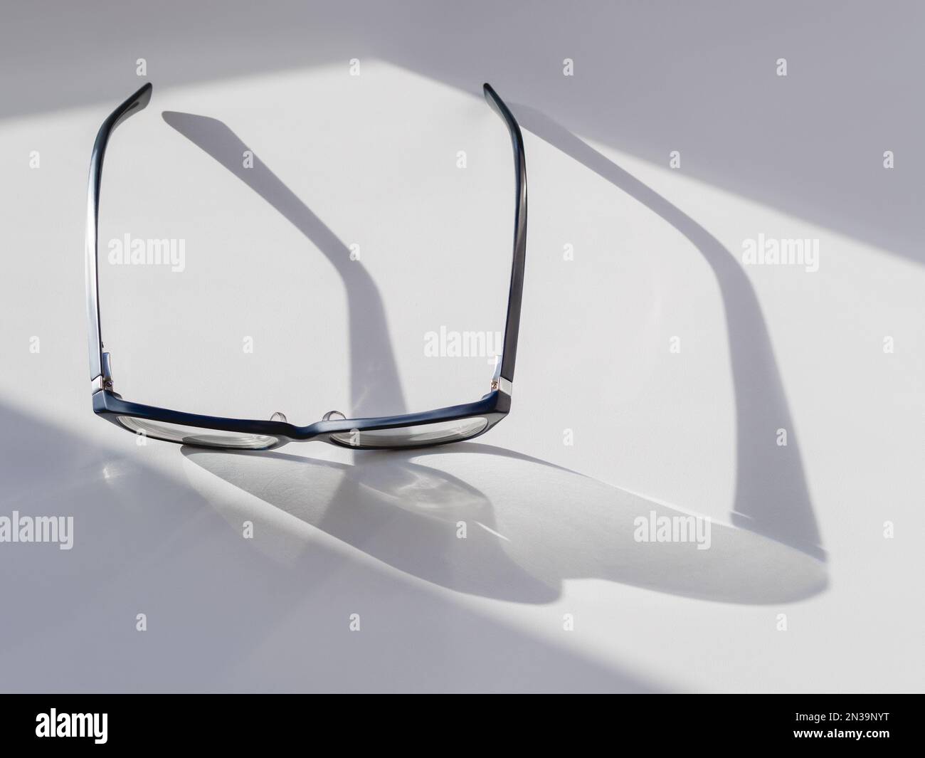 Top view of eyeglasses on white background. Comfortable life with poor ...