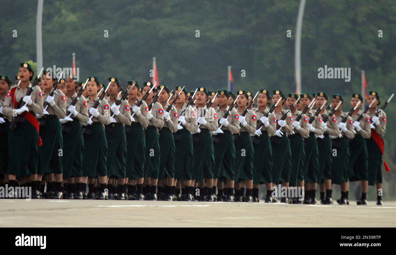 Myanmar female soldiers march during a ceremony to mark the 67th ...