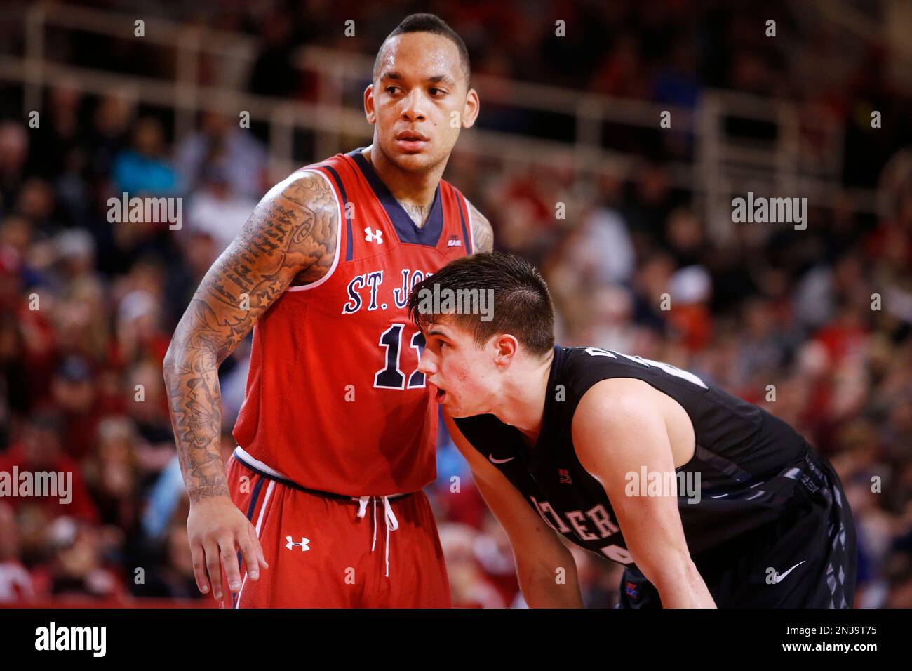 St. John's D'Angelo Harrison (11) guards Butler's Kellen Dunham during ...