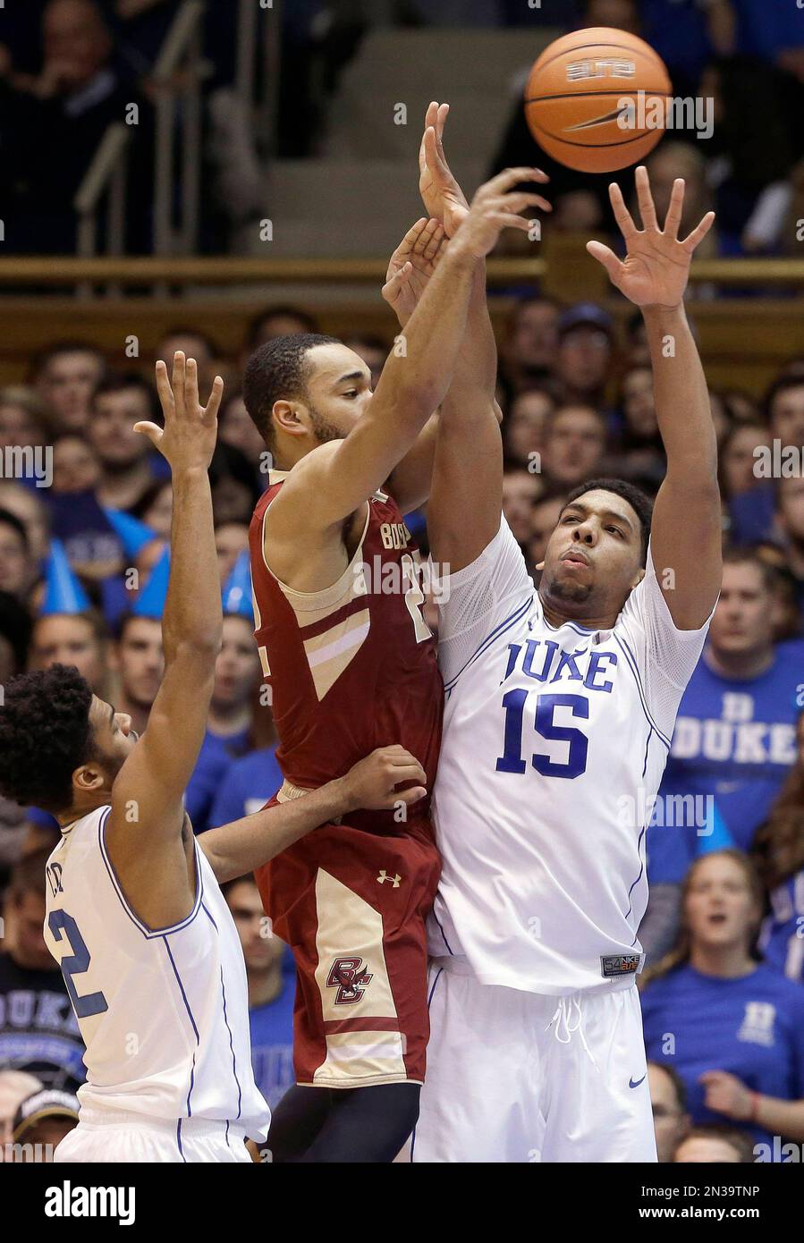 Duke's Jahlil Okafor (15) and Quinn Cook, left, guard Boston College's ...