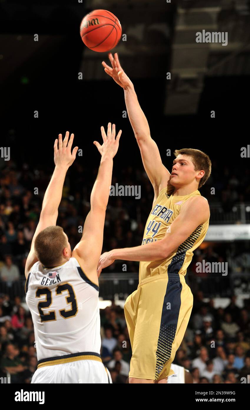 Georgia Tech center Ben Lammers, right, puts up a shot over Notre Dame ...