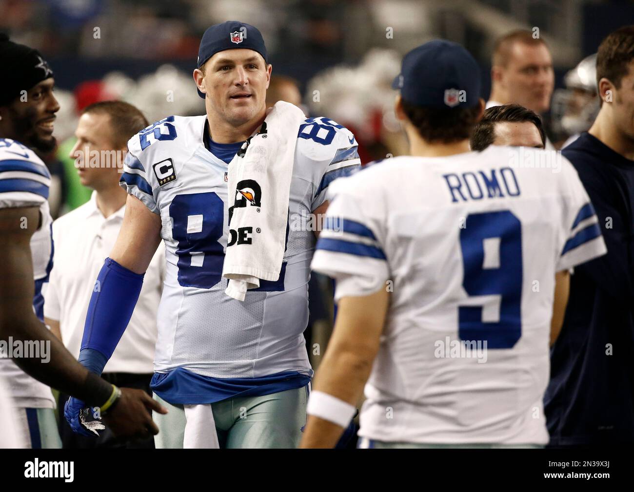 Dallas Cowboys tight end Jason Witten (82) talks with quarterback Tony ...