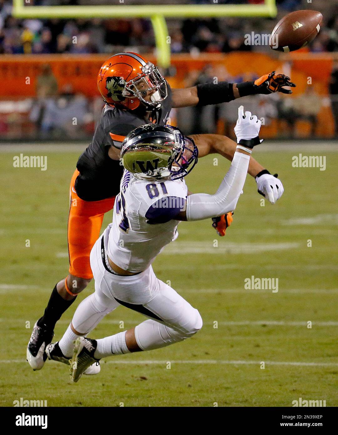 Oklahoma State cornerback Kevin Peterson breaks up a pass intended for ...