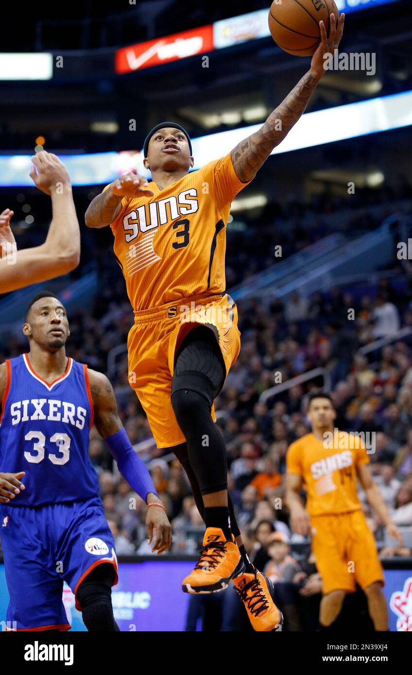 Phoenix Suns' Isaiah Thomas (3) drives past Philadelphia 76ers' Robert ...