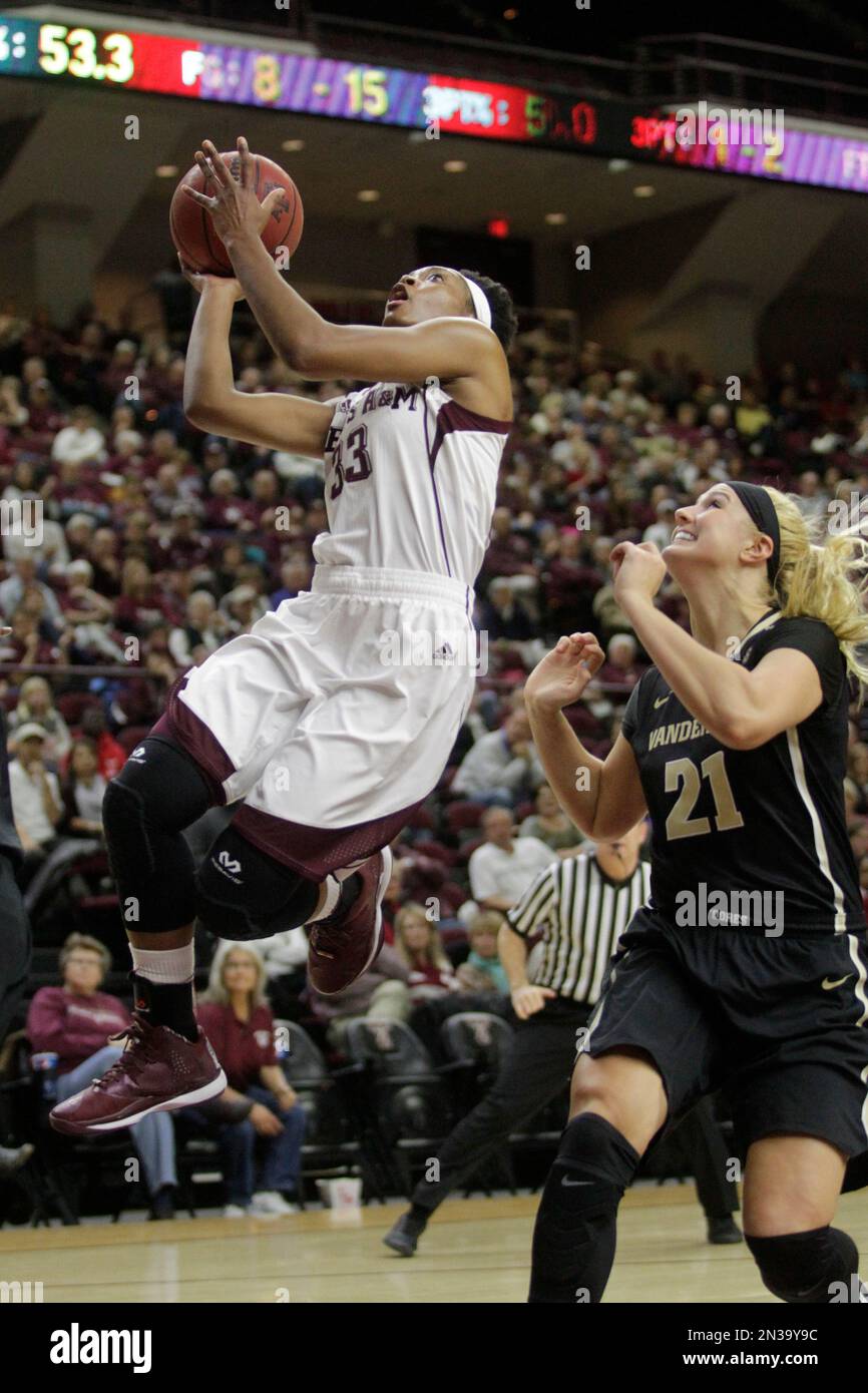 Texas A&M's Courtney Walker (33) shoots in front of Vanderbilt's ...